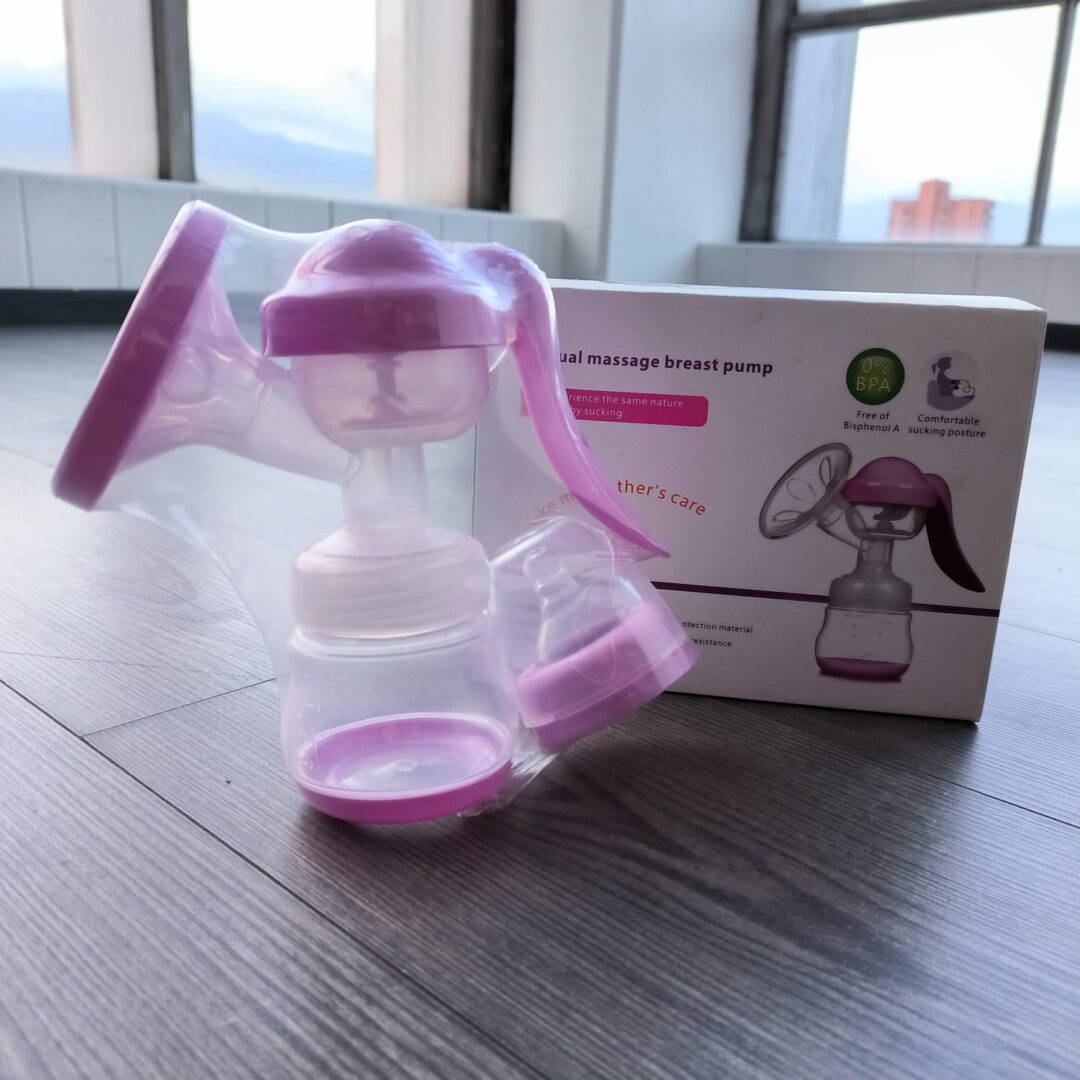 Extractor de Leche Manual con Tetero y con Chupa Maternidad